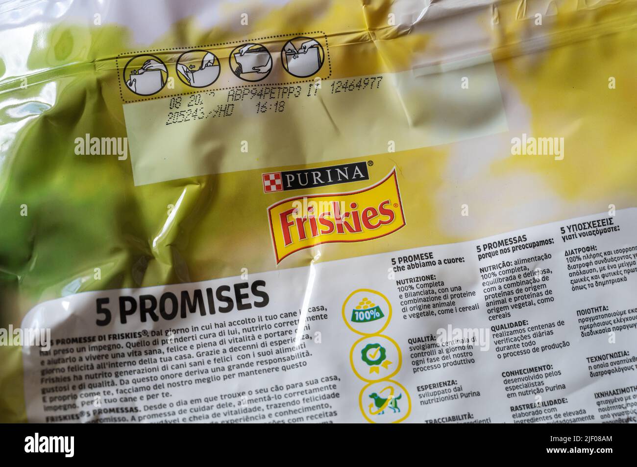 Close-up of dog food packaging. Purina Friskies. Purina, is an American ...