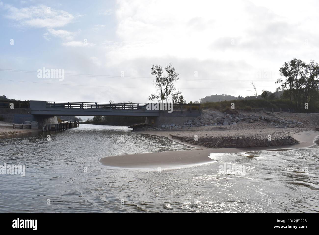 A flowing river under a bridge in Montague Stock Photo - Alamy