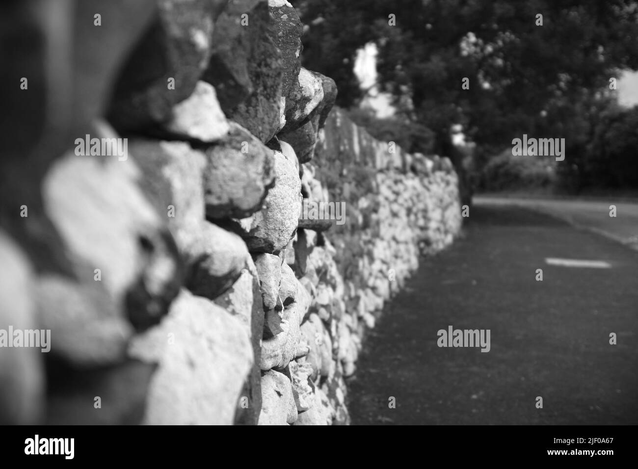 Side view stone wall Black and White Stock Photos & Images - Alamy