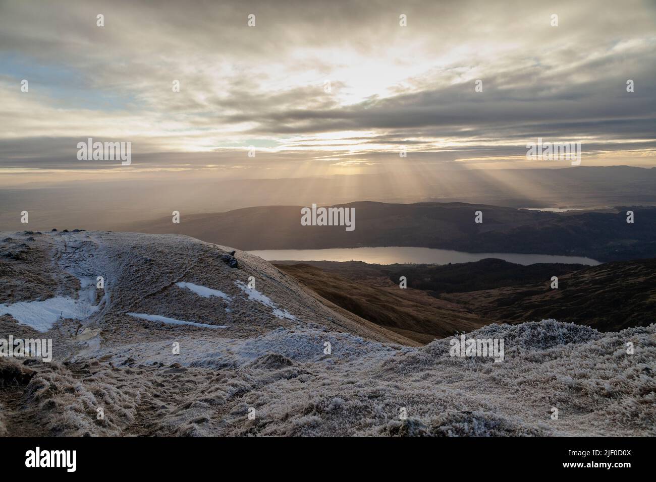 Heaven rays from the summit of Ben Ledi mountain with Loch Venachar ...