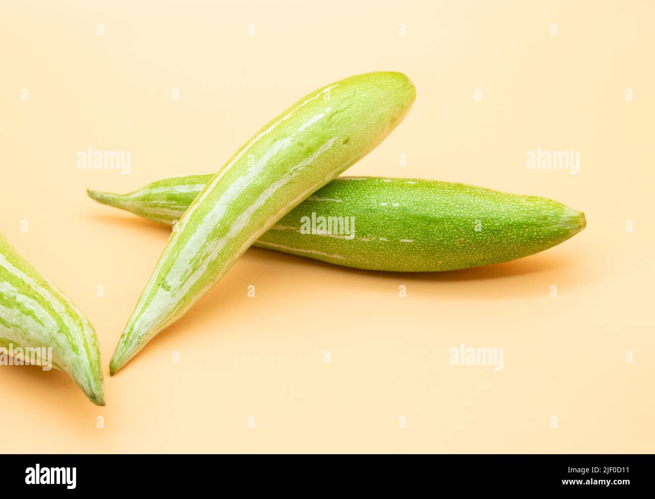 Snake gourd isolated on background. flat lay with clipping path Stock ...
