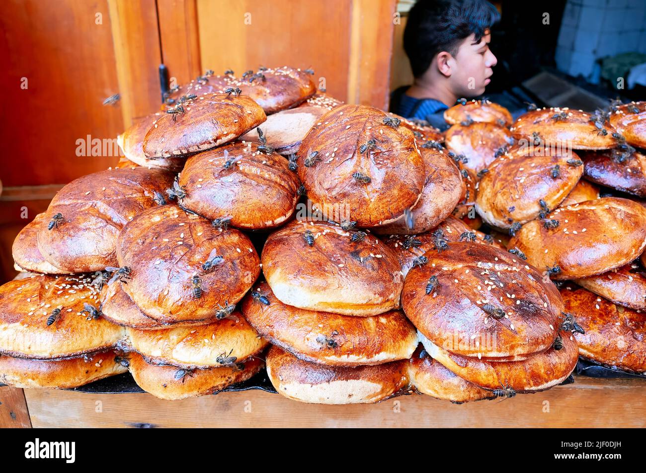 Morocco Fez. Fly infested loaf of bread Stock Photo - Alamy