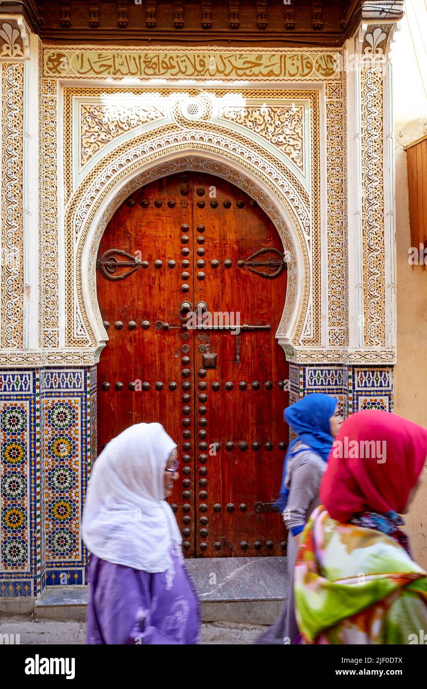 Morocco Fez. Women walking in the Medina Stock Photo - Alamy