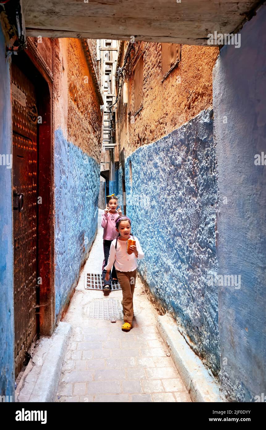 Morocco Fez. Happy children in the narrow alleys of the Medina Stock ...