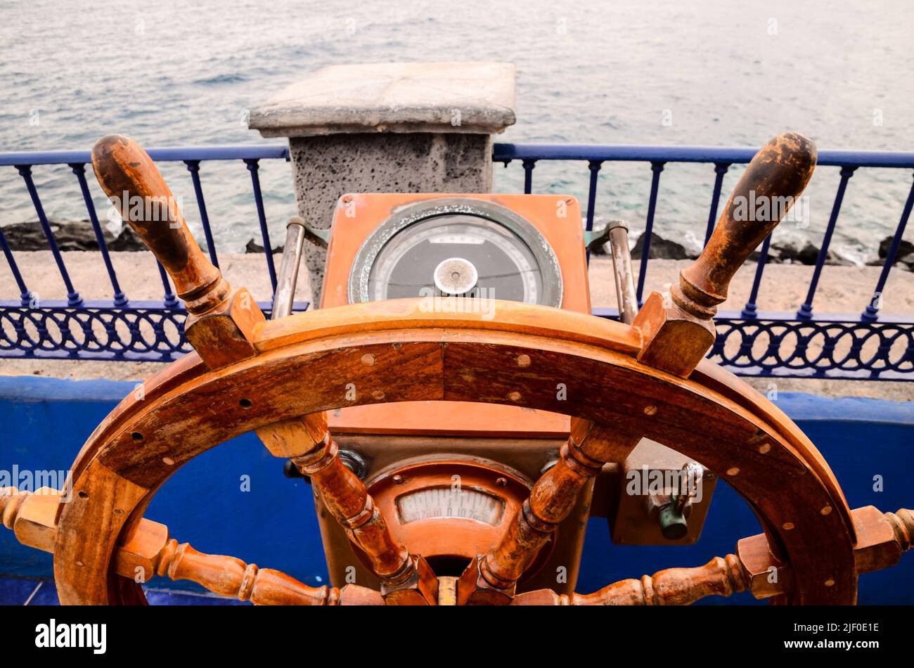 Old Vintage Wooden Helm Wheel near Blue Ovcean Stock Photo - Alamy