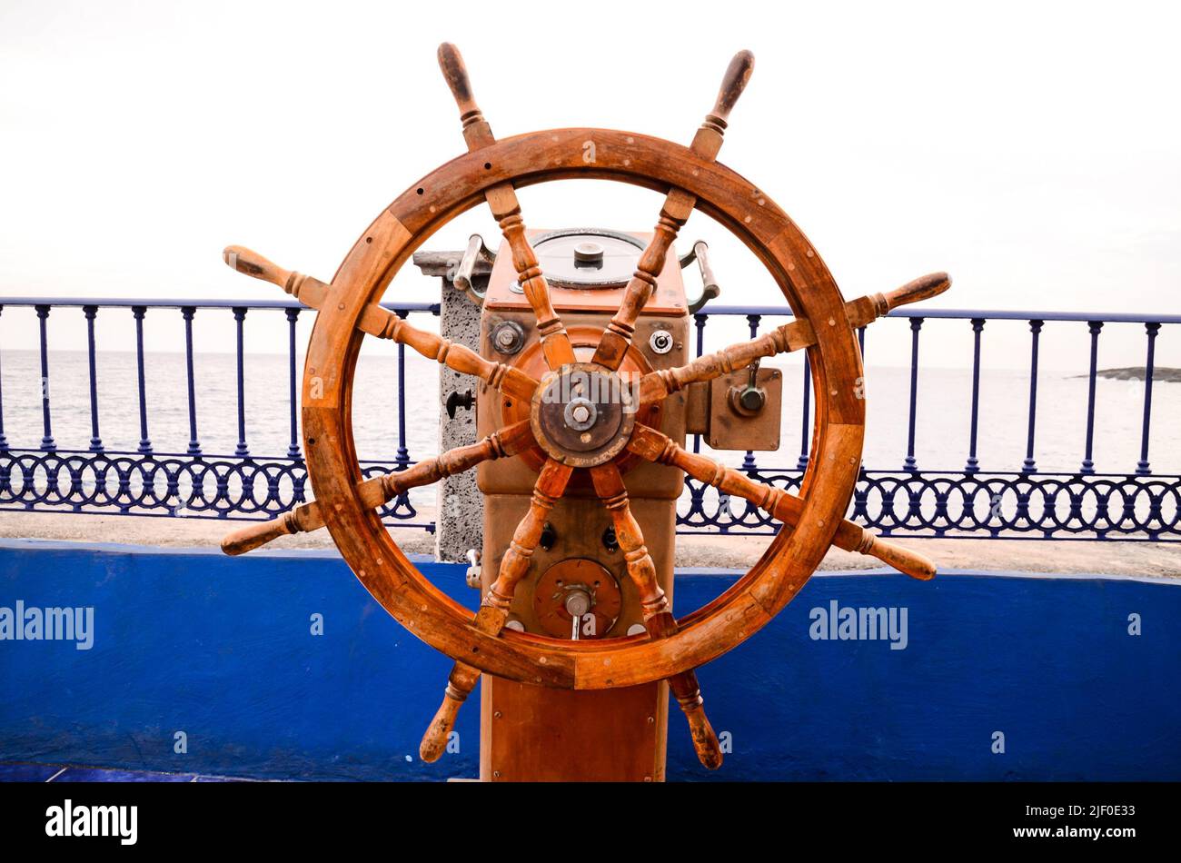 Old Vintage Wooden Helm Wheel near Blue Ovcean Stock Photo - Alamy