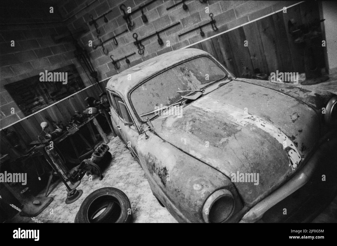 Very old car in the old mechanical workshop. Standard Motor Company ...