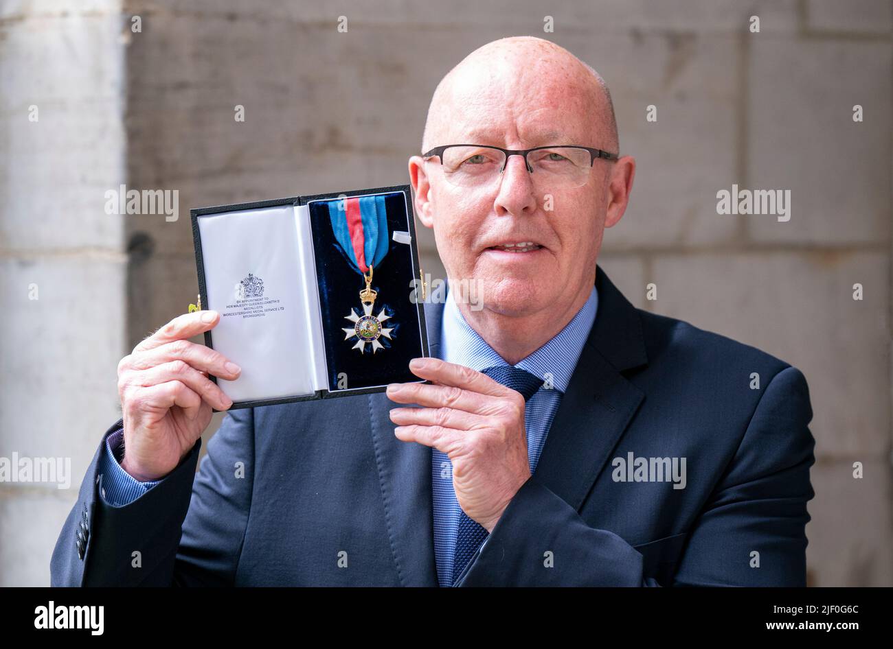 James McGoldrick after receiving the Order of Saint Michael and Saint ...