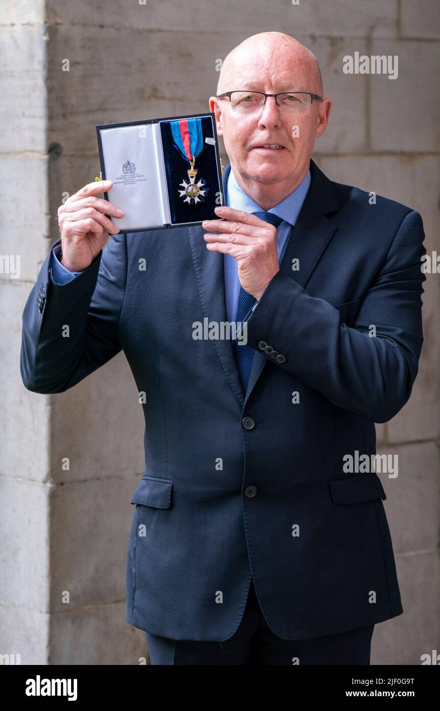 James McGoldrick after receiving the Order of Saint Michael and Saint ...