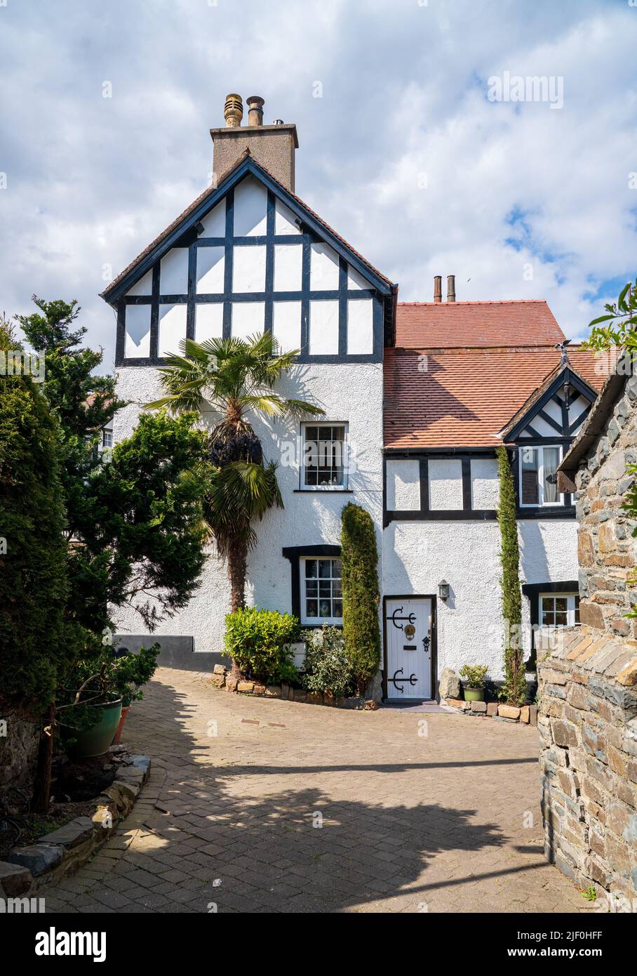 Conwy, Wales - 24 April 2022: Pretty Victorian home and courtyard in ...