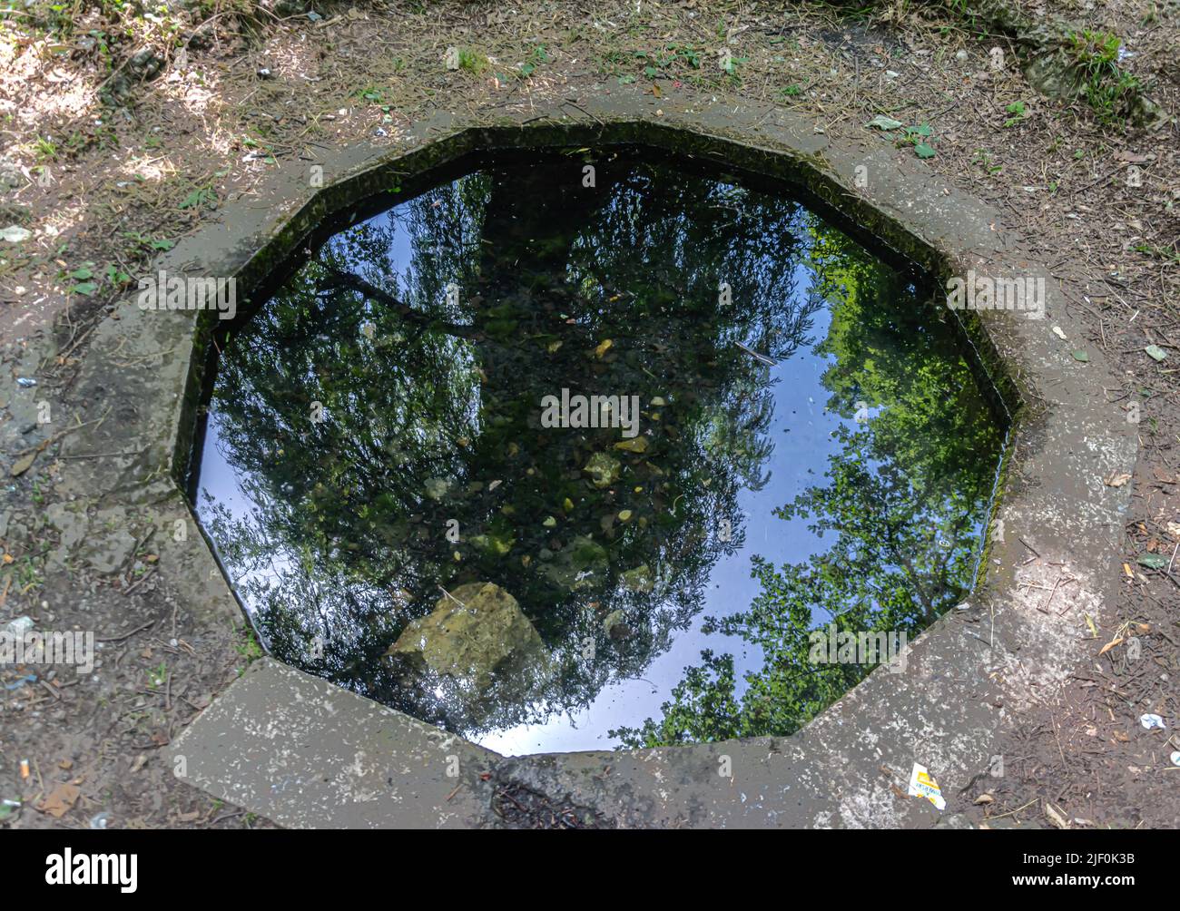 Rain drops on puddle pond hi-res stock photography and images - Alamy