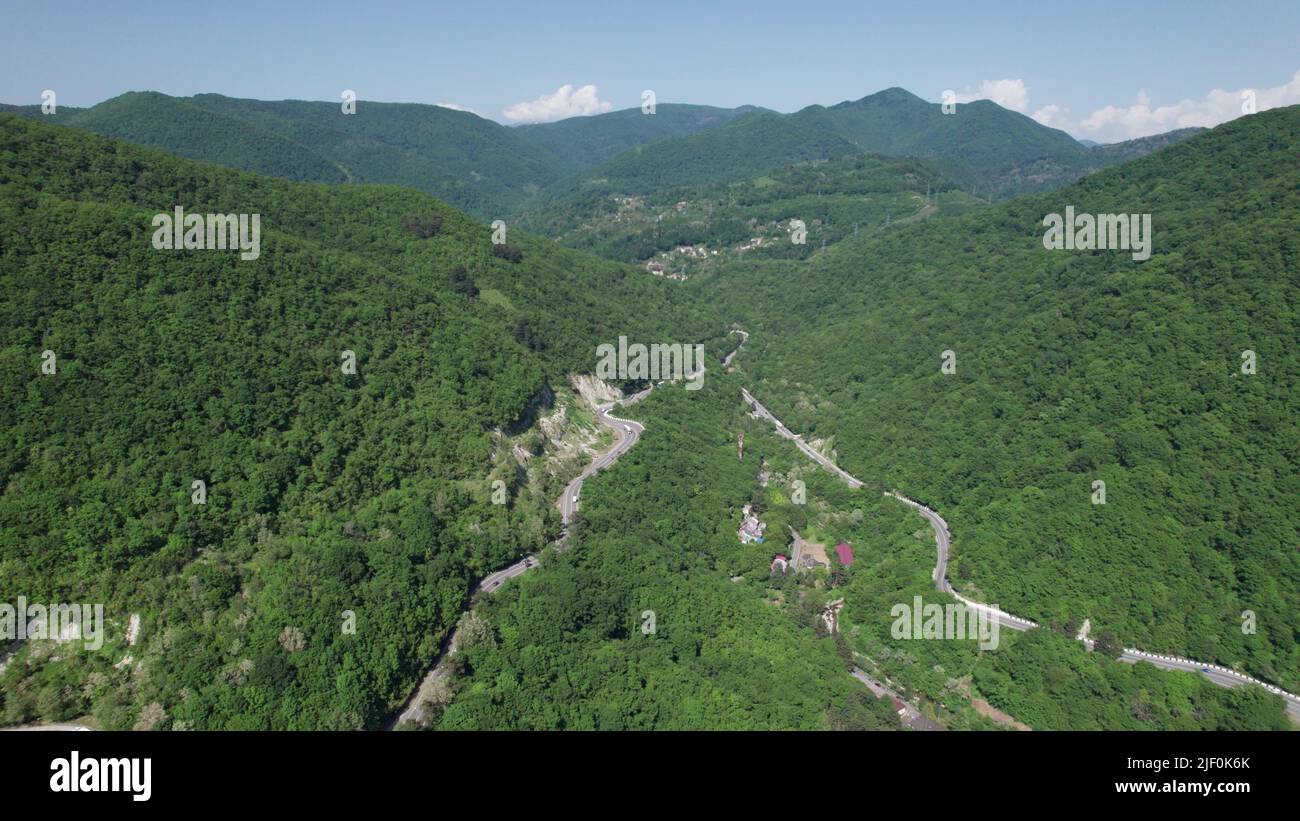Aerial view of winding road from the high mountain pass. Great road ...