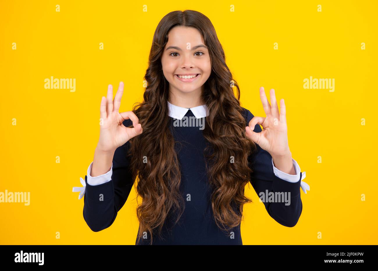 Okay. Portrait of a little teenager child girl showing okay gesture ...