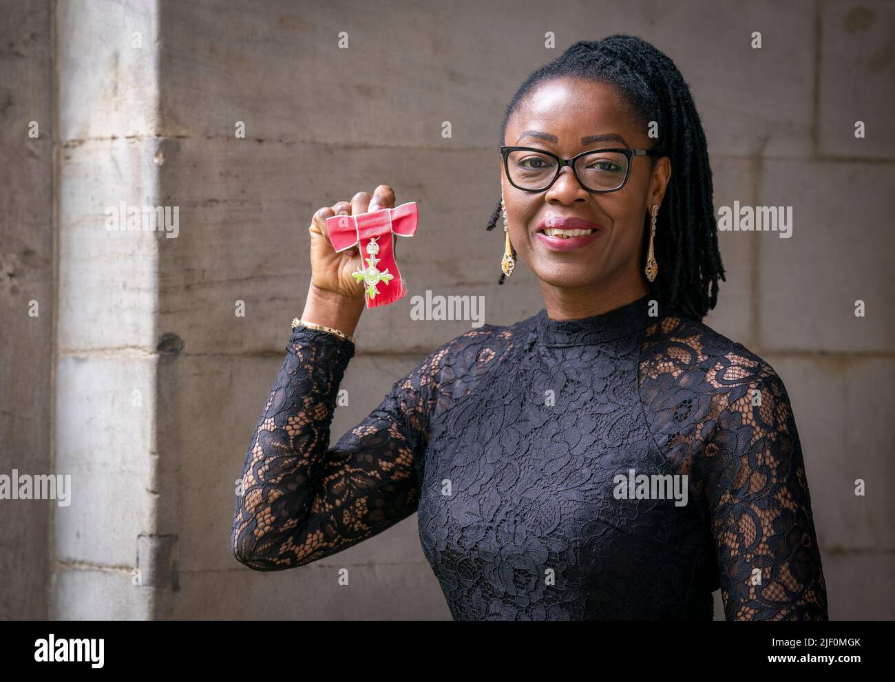 Dr Adaeze Ifezulike after receiving her MBE from the Princess Royal at ...