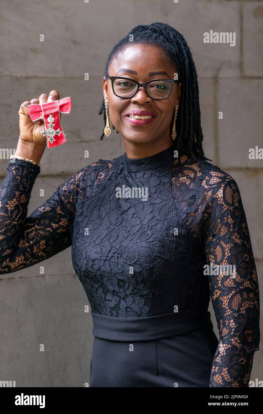 Dr Adaeze Ifezulike after receiving her MBE from the Princess Royal at ...