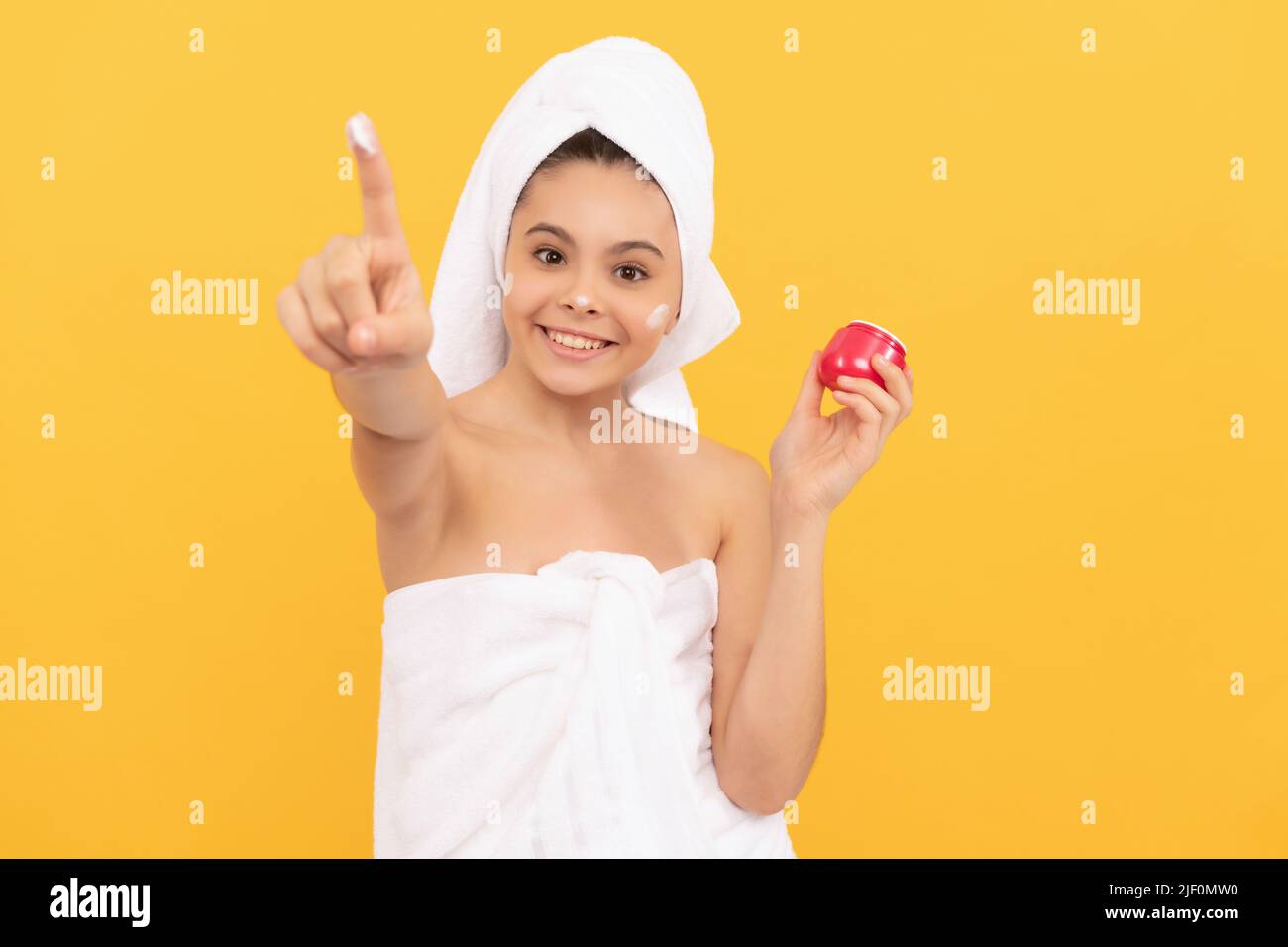 Happy Teen Girl In Shower Towel Apply Facial Cream Selective Focus