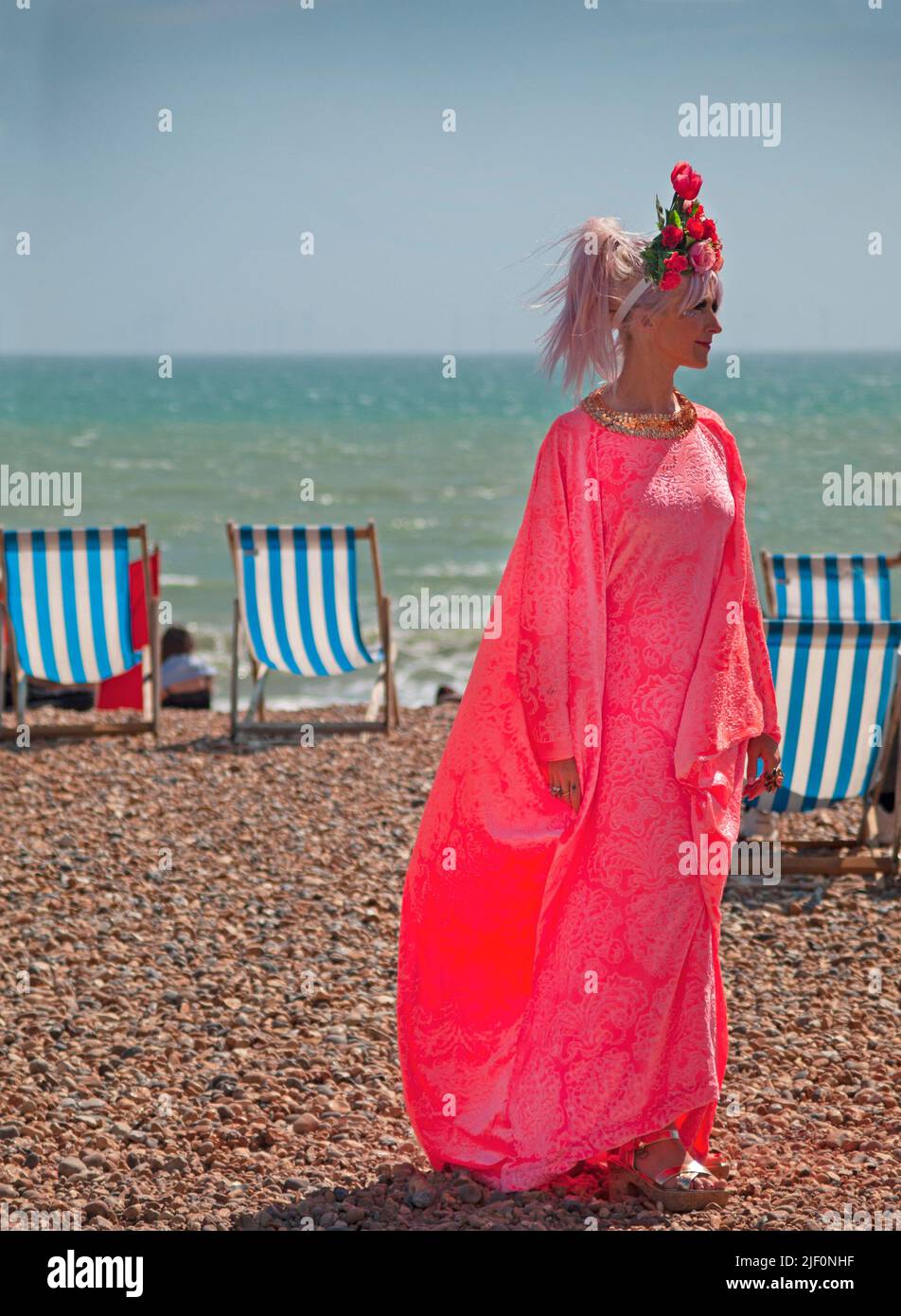 A beautifully dressed female on the beach at Brighton Stock Photo - Alamy