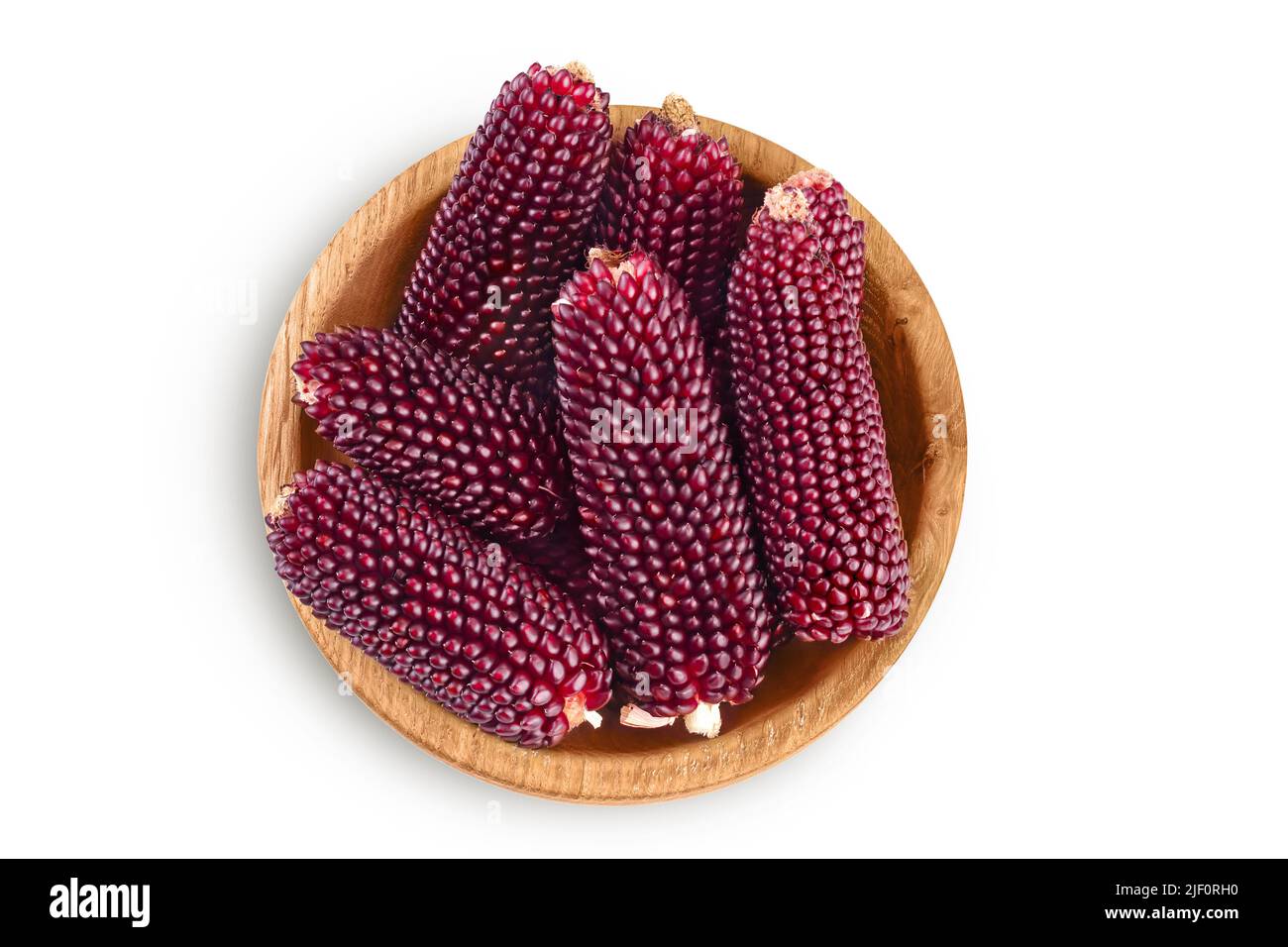 Purple corn in wooden bowl isolated on white background with full depth ...