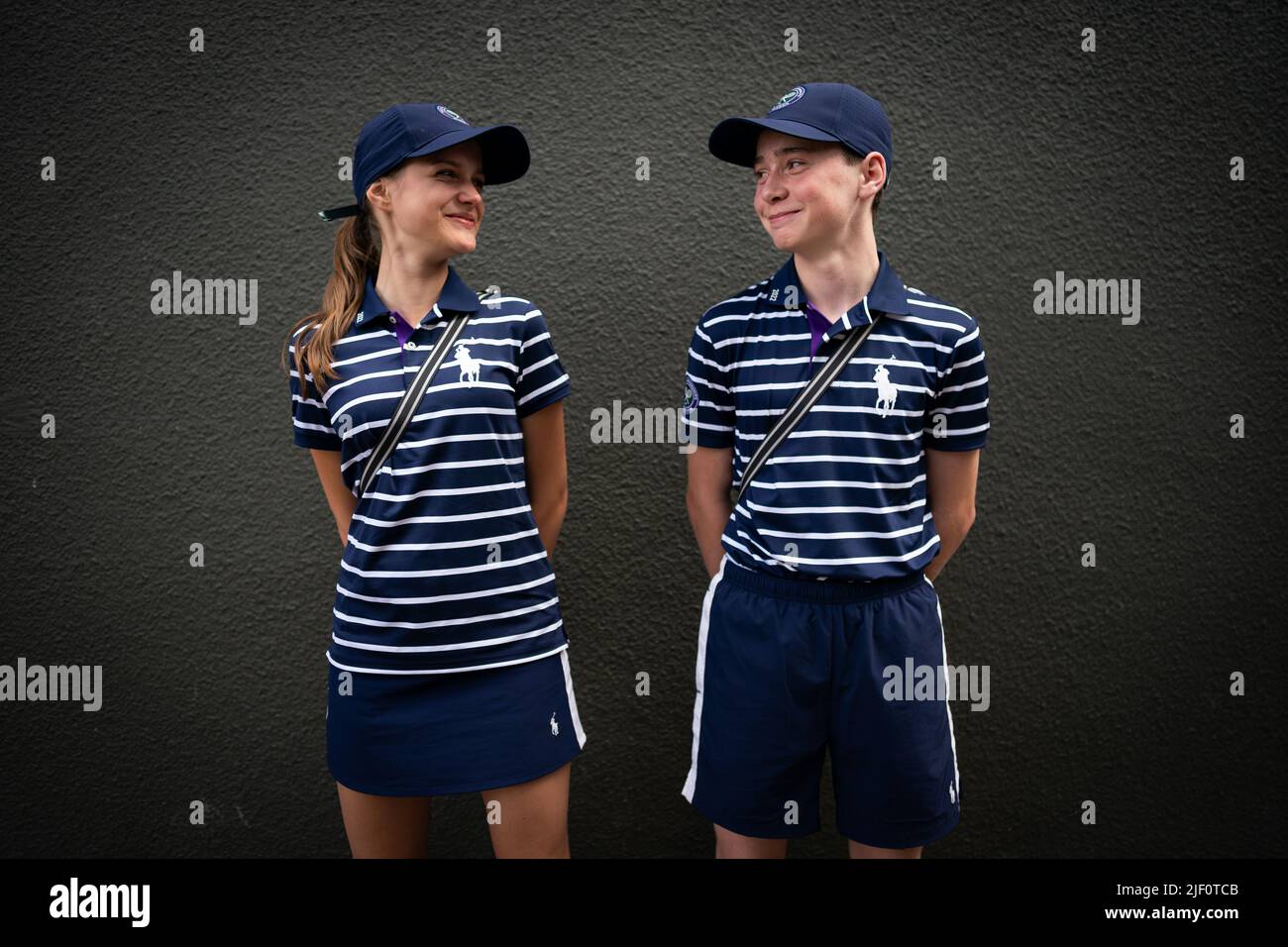 Ball girl Nadine Gainsburgh (left) and ball boy Thomas Cheatle during ...