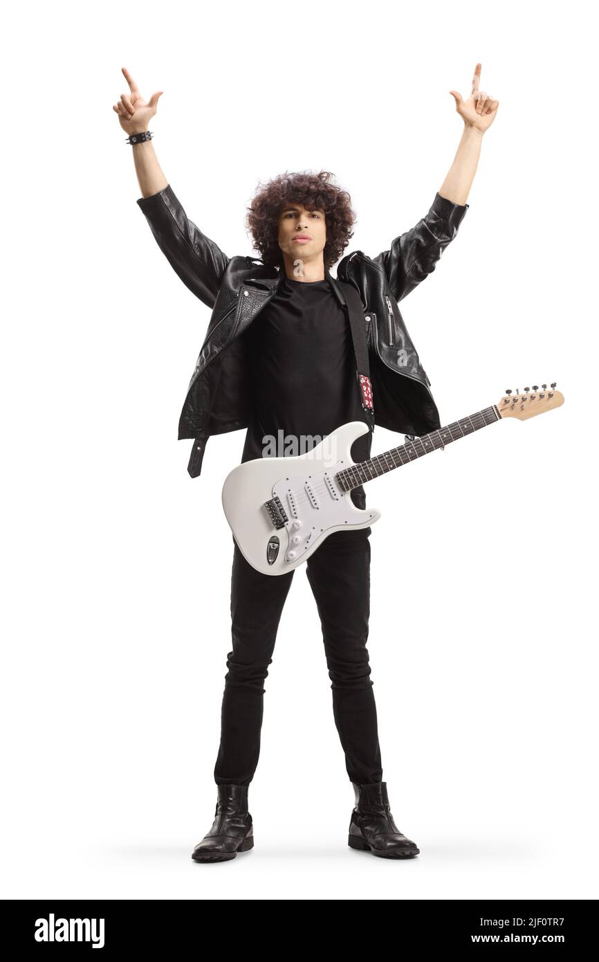 Full length portrait of a male musician with an electric guitar lifting ...