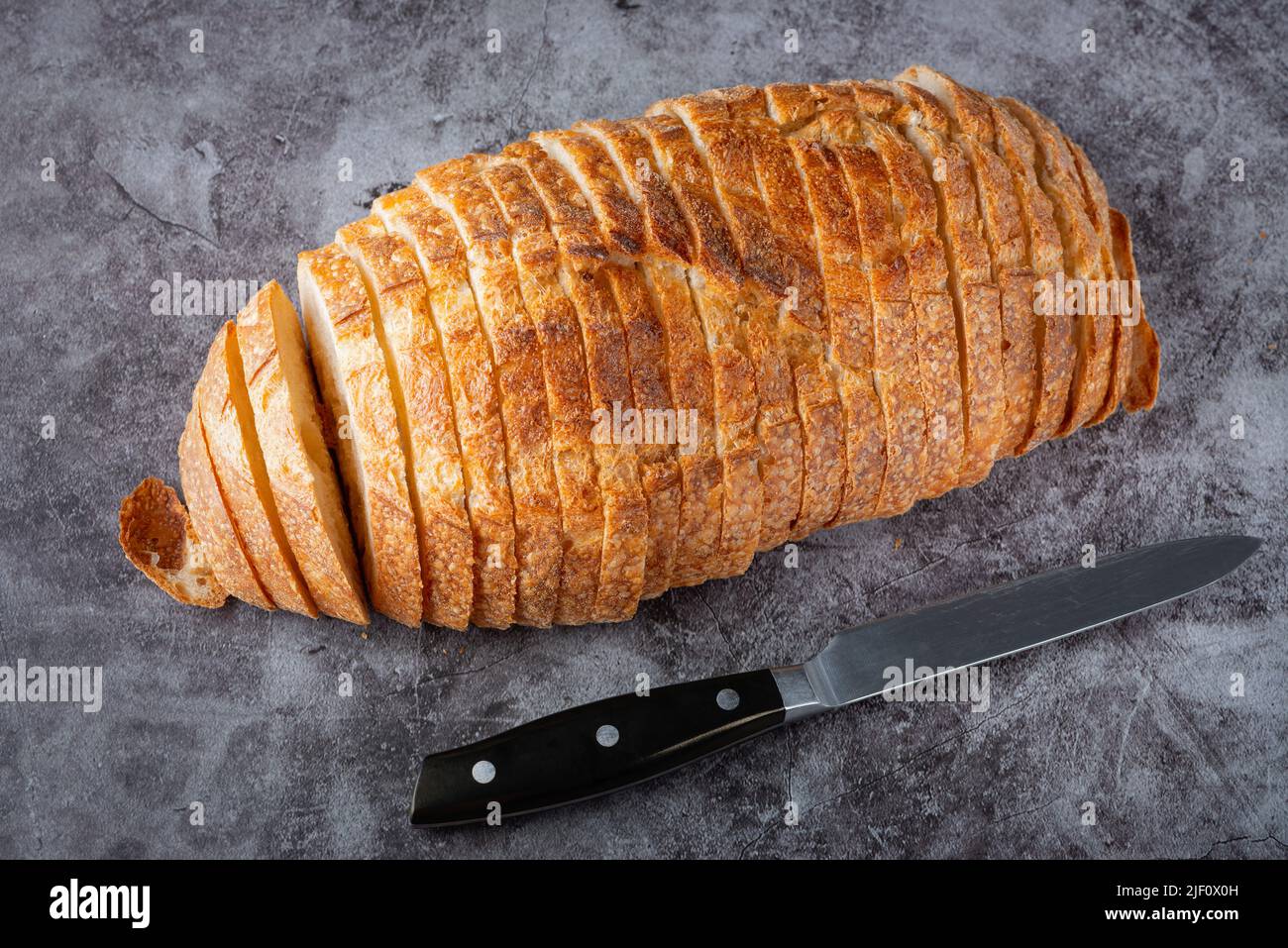 Fresh white loaf of bread on gray cement background. Top view Stock ...