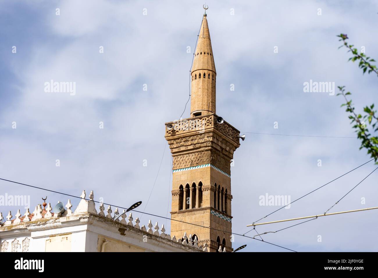 Low angle view of the EL Atik mosque minaret in Setif city. The famous ...