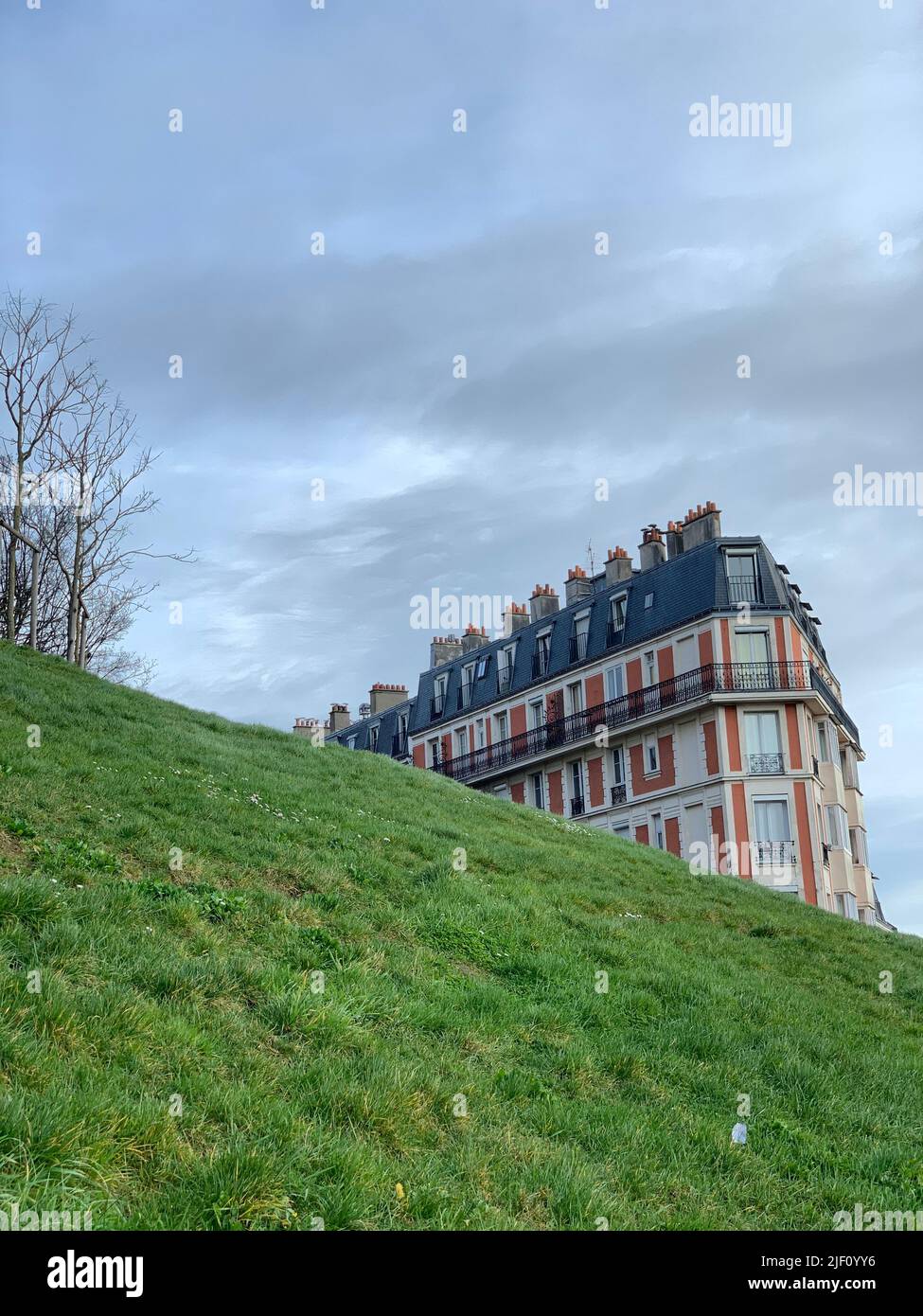 A vertical shot of the sinking house in Montmarte, Paris - optical ...