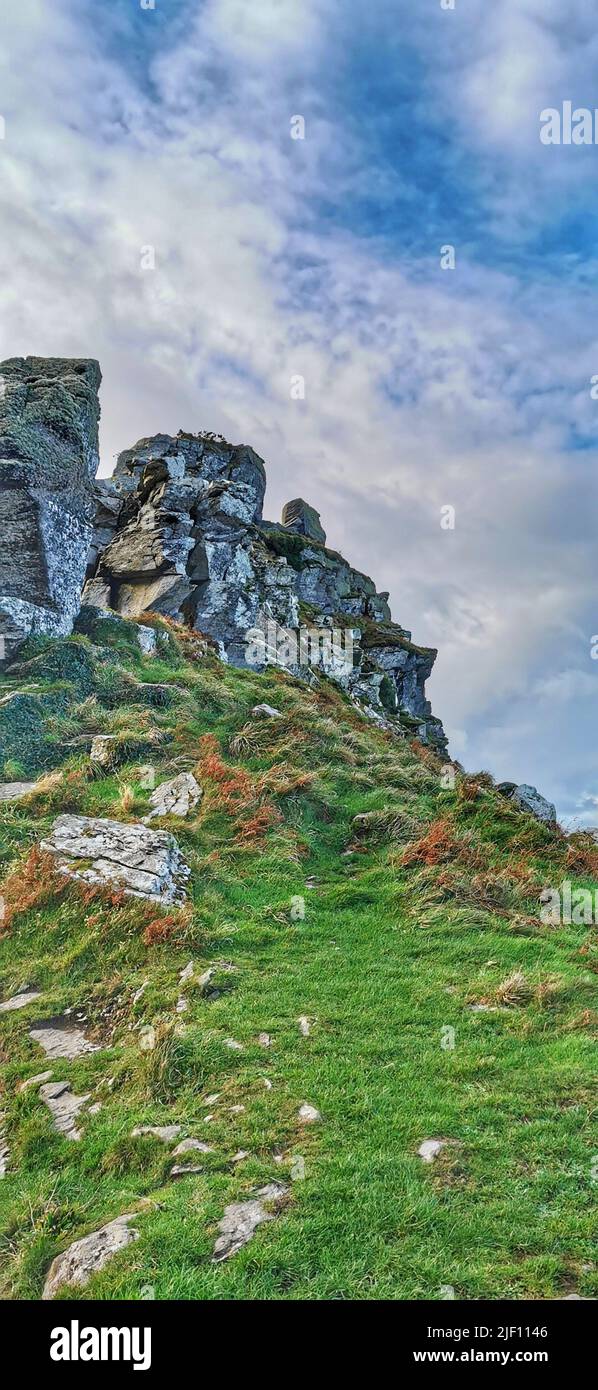A vertical low-angle shot of the Valley of the Rocks in England Stock ...