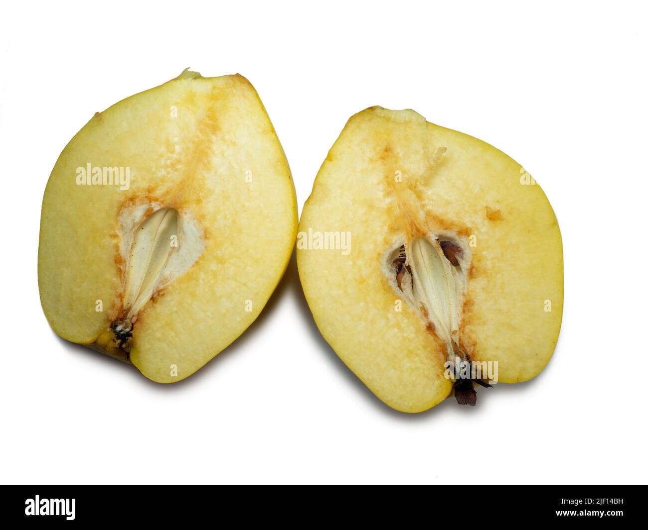 Sliced quince. Juicy fruit on a white background. Ripe useful product ...