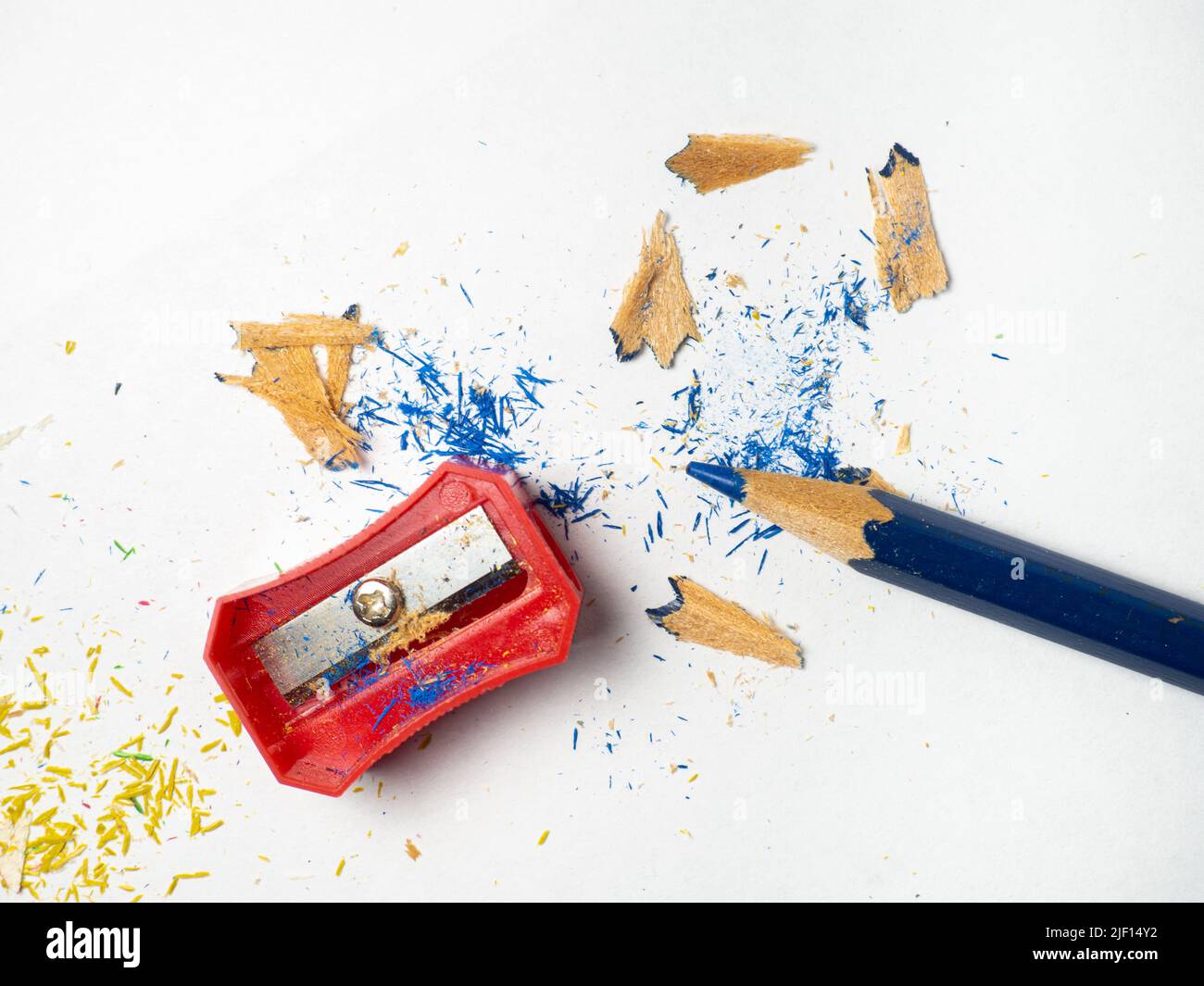 Artist's workshop. School supplies. Pencil sharpening. Multicolored ...