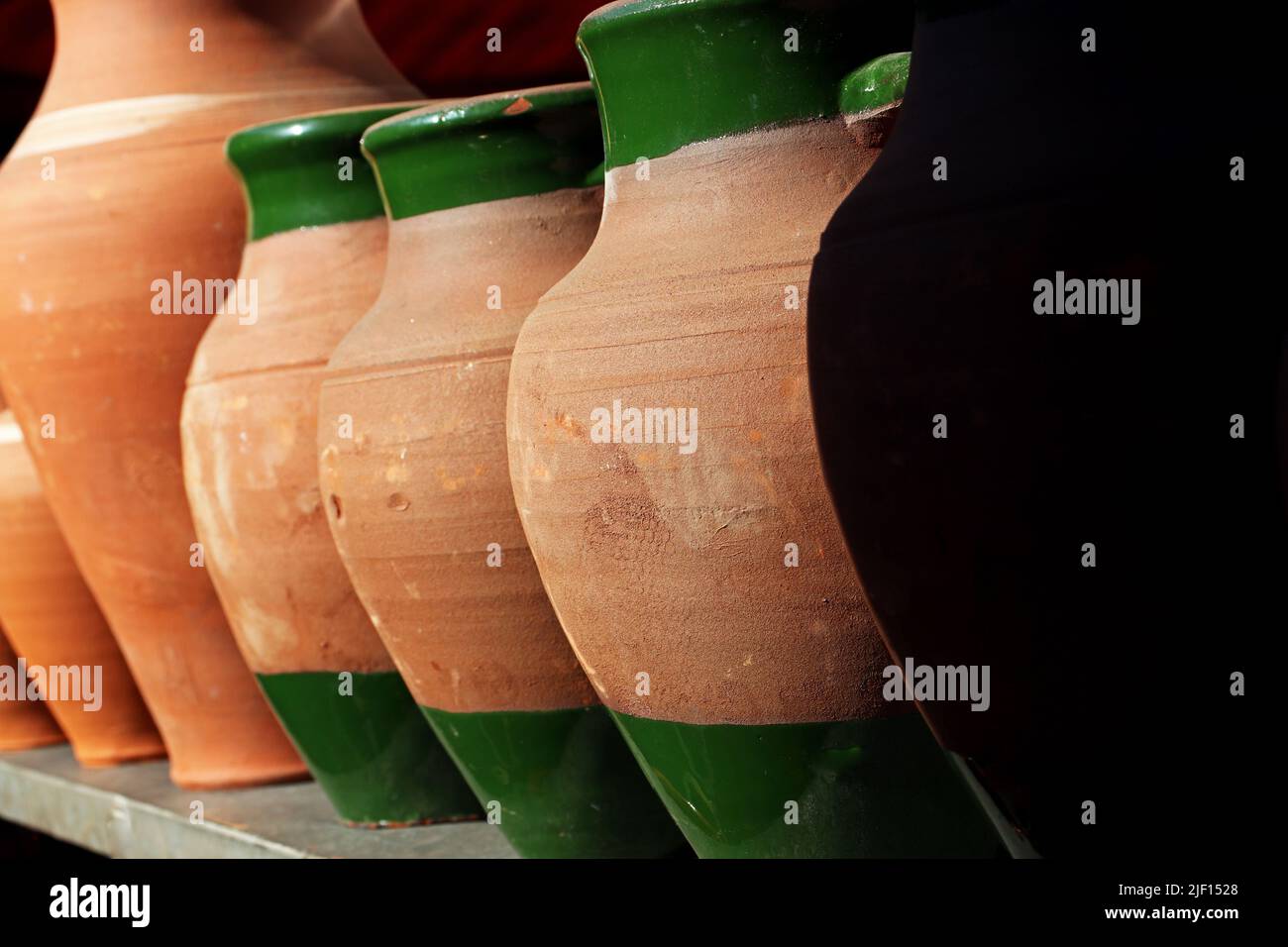 Close-up clay pots on a market stall Stock Photo - Alamy