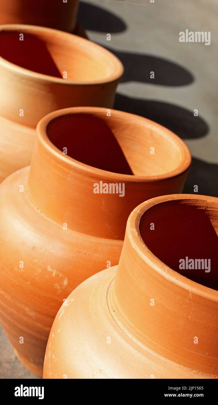 Close-up clay pots on a market stall Stock Photo - Alamy