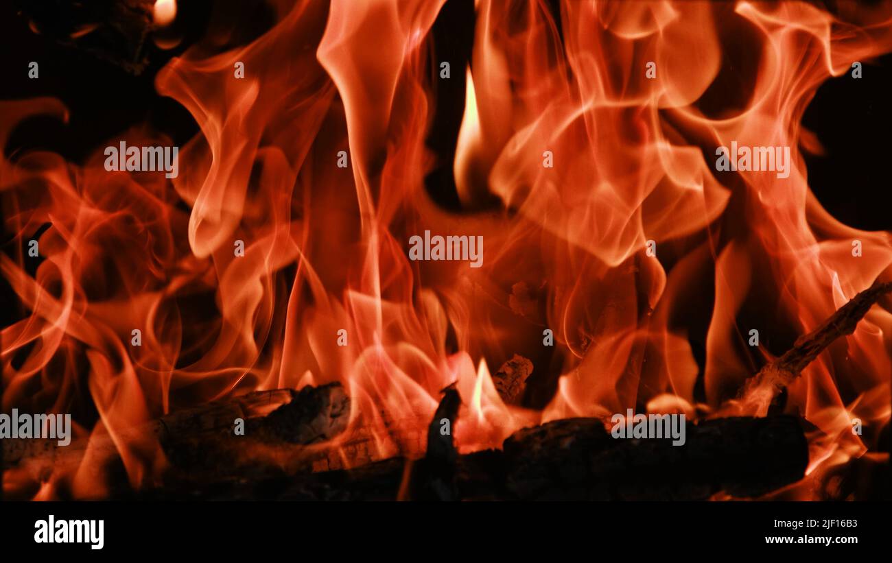 Fire flames from a wood stove fire isolated on a black background Stock ...