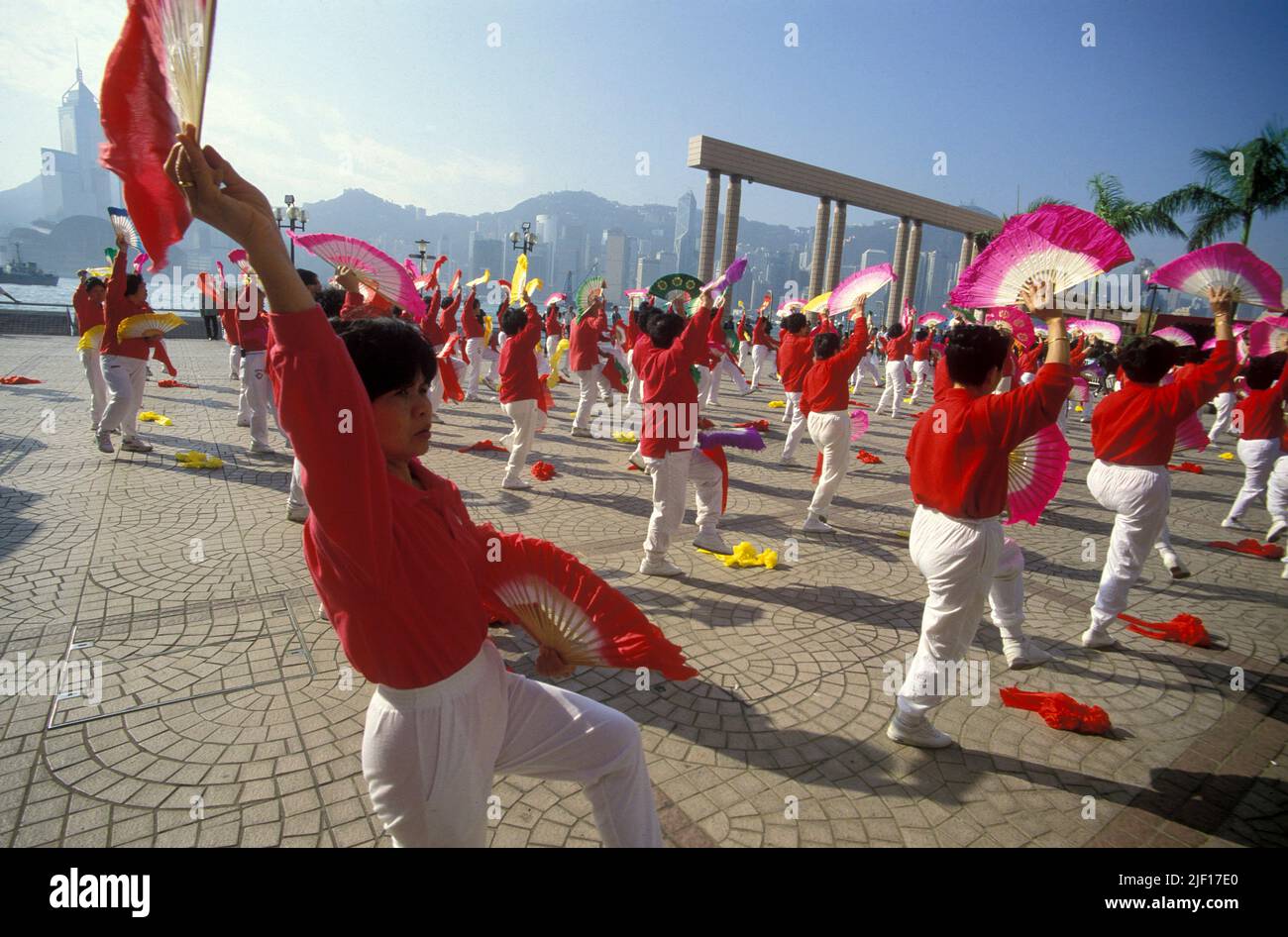 traditional chinese dance at the waterfront of Kowloon in front of the ...