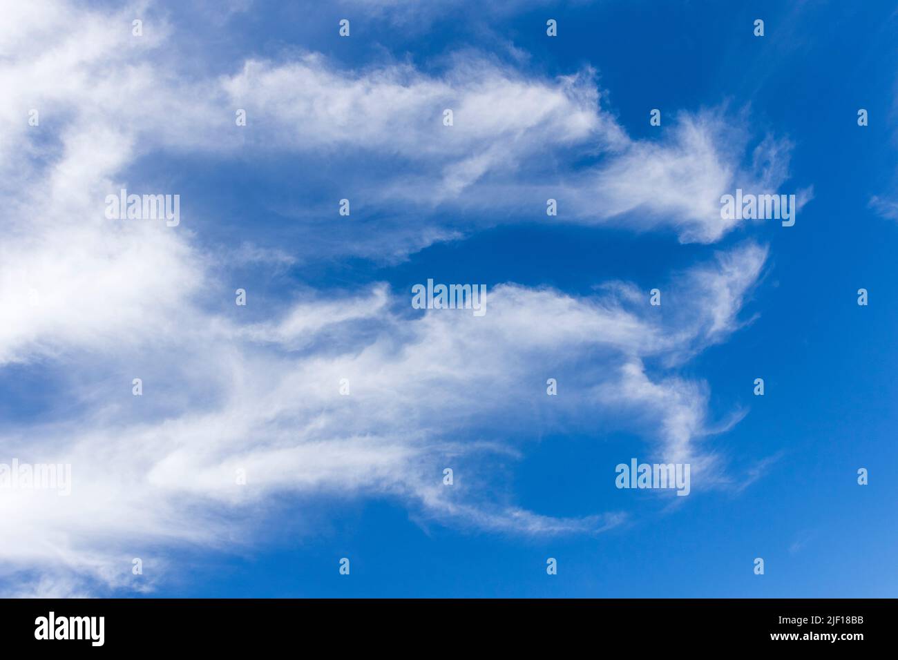Cirrus clouds formation at blue sky Stock Photo - Alamy