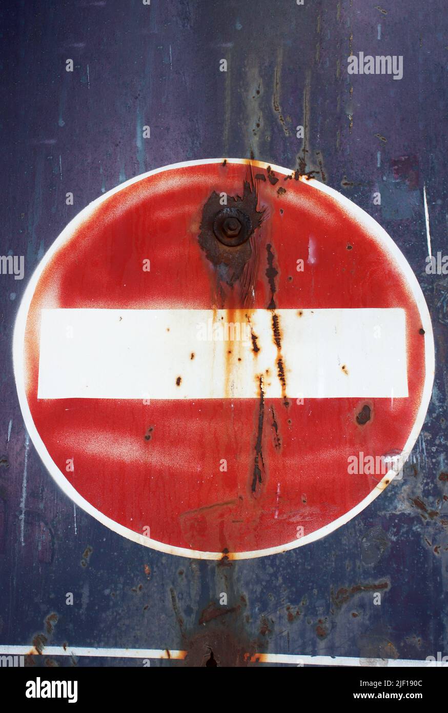 Dirty red and white no parking sign background Stock Photo - Alamy