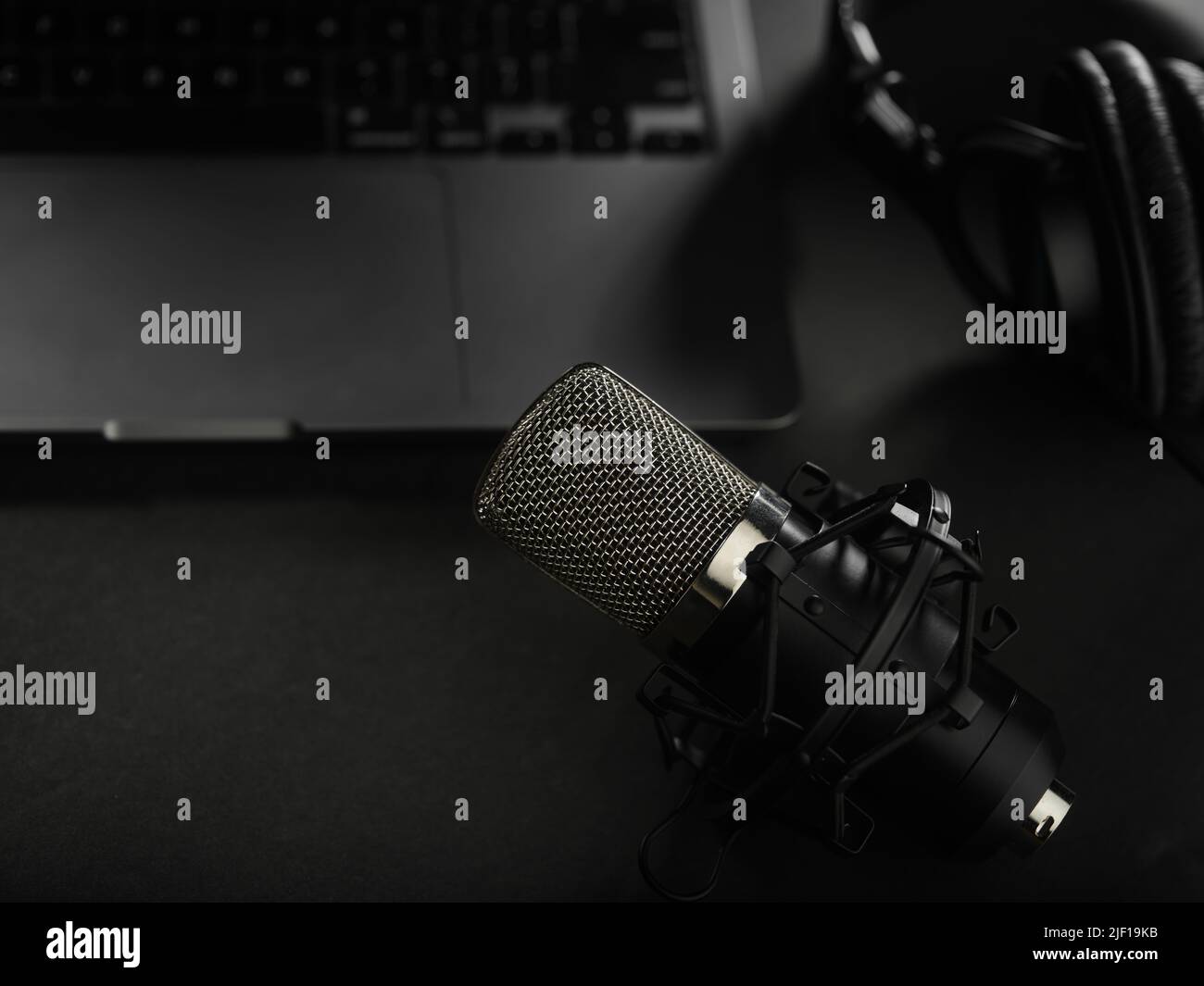 Professional technological equipment. The laptop has studio headphones ...