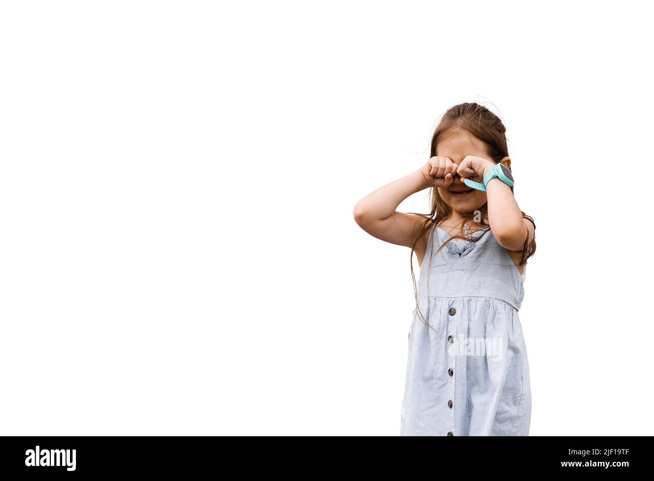 Weeping kid closes her face with hands. Adorable upset child girl ...
