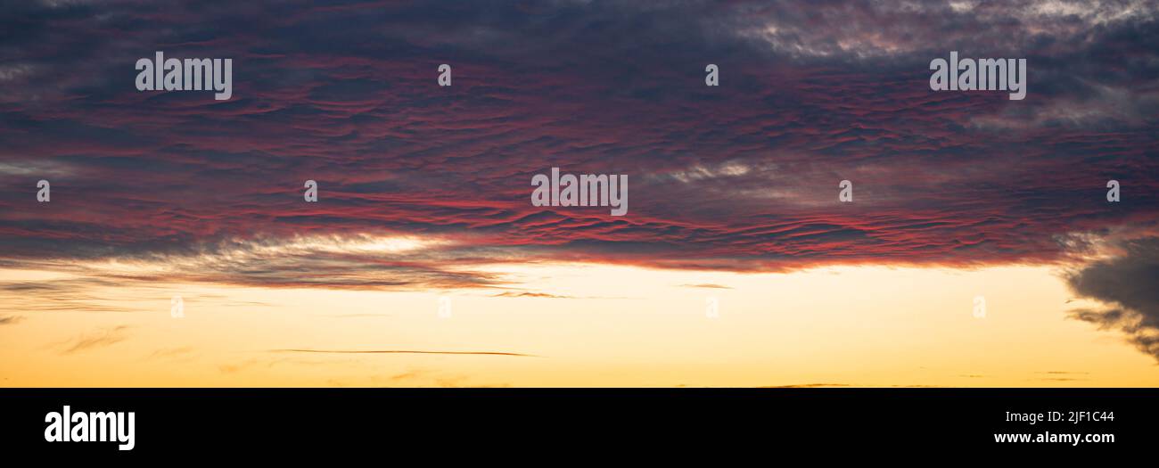 Panoramic sunset altocumulus clouds in hi-res stock photography and ...