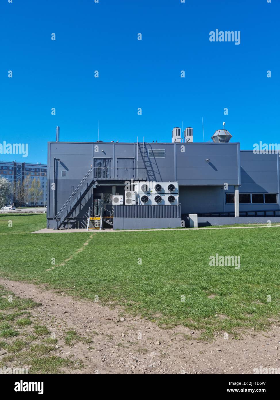 Air ventilation and cooling systems at the facade of a grocery store ...