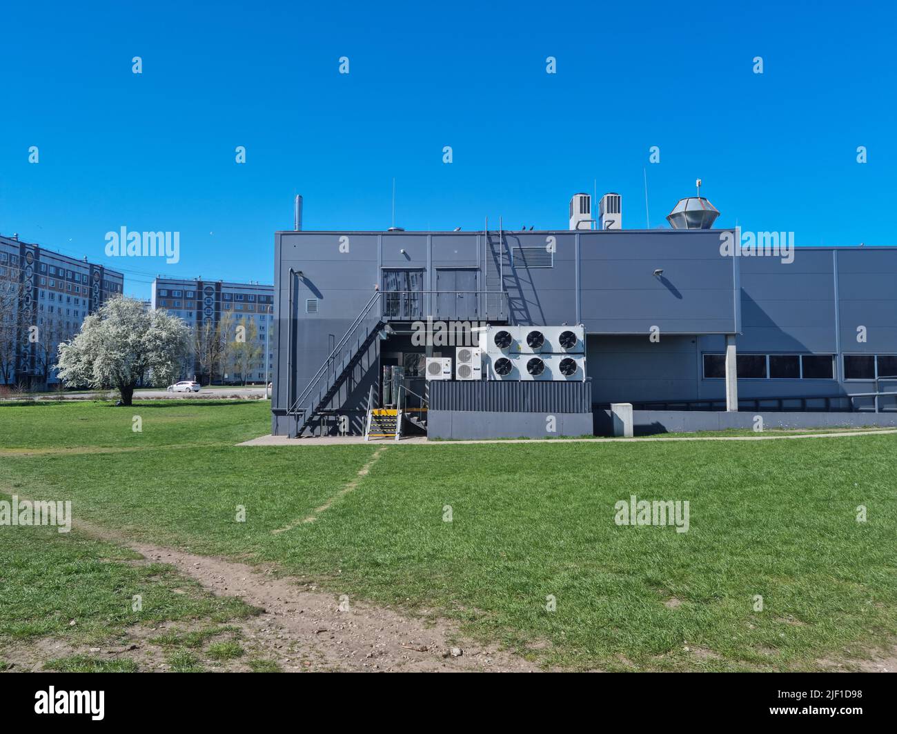 Air ventilation and cooling systems at the facade of a grocery store ...