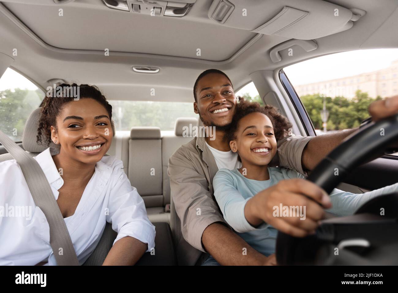 Family Driving In Car