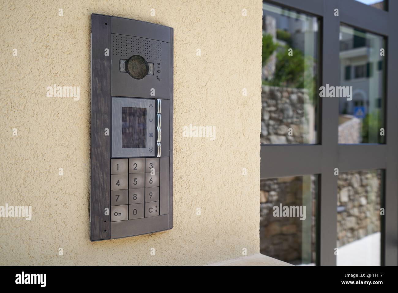Modern intercom with code and video surveillance Stock Photo - Alamy