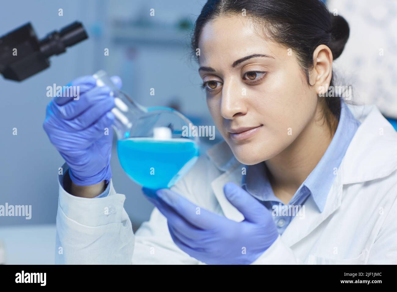 Indian women working microscope hi-res stock photography and images - Alamy