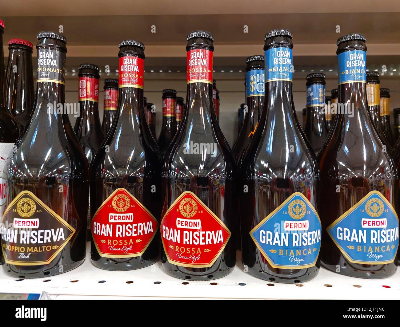 Peroni Gran Riserva beer bottles in a supermarket Stock Photo - Alamy