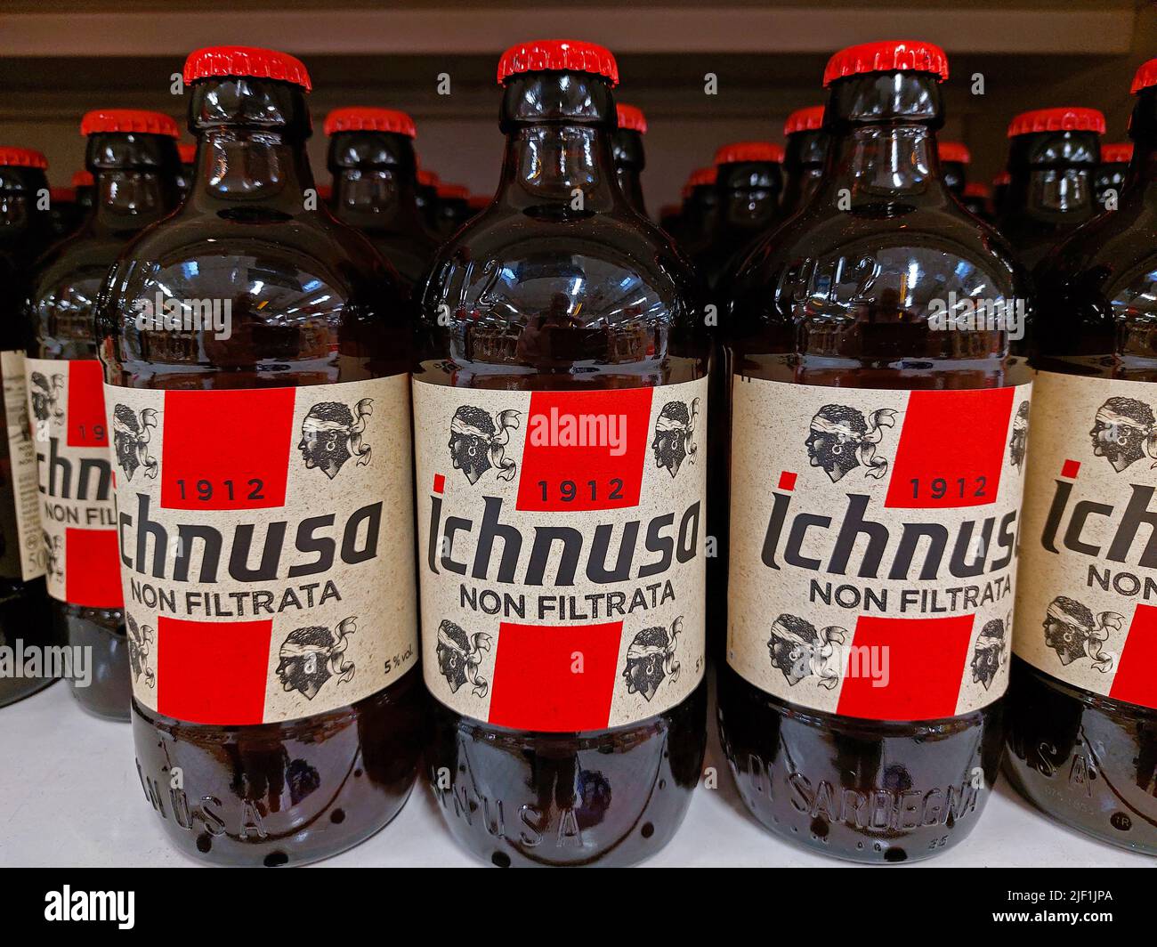 ichnusa beer bottles in a supermarket Stock Photo - Alamy
