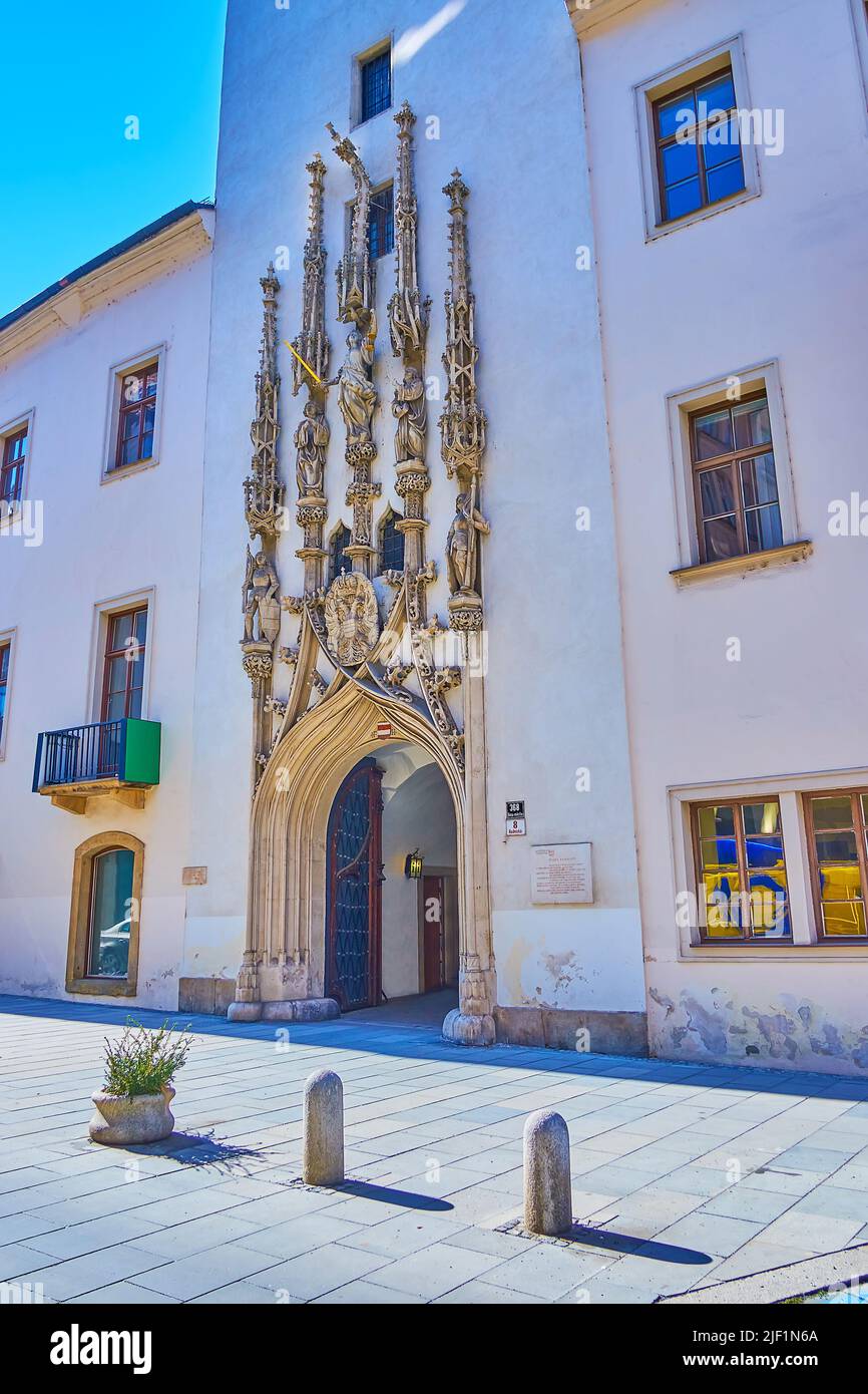 The great portal with carved sculptures and tall pinnacles is a ...