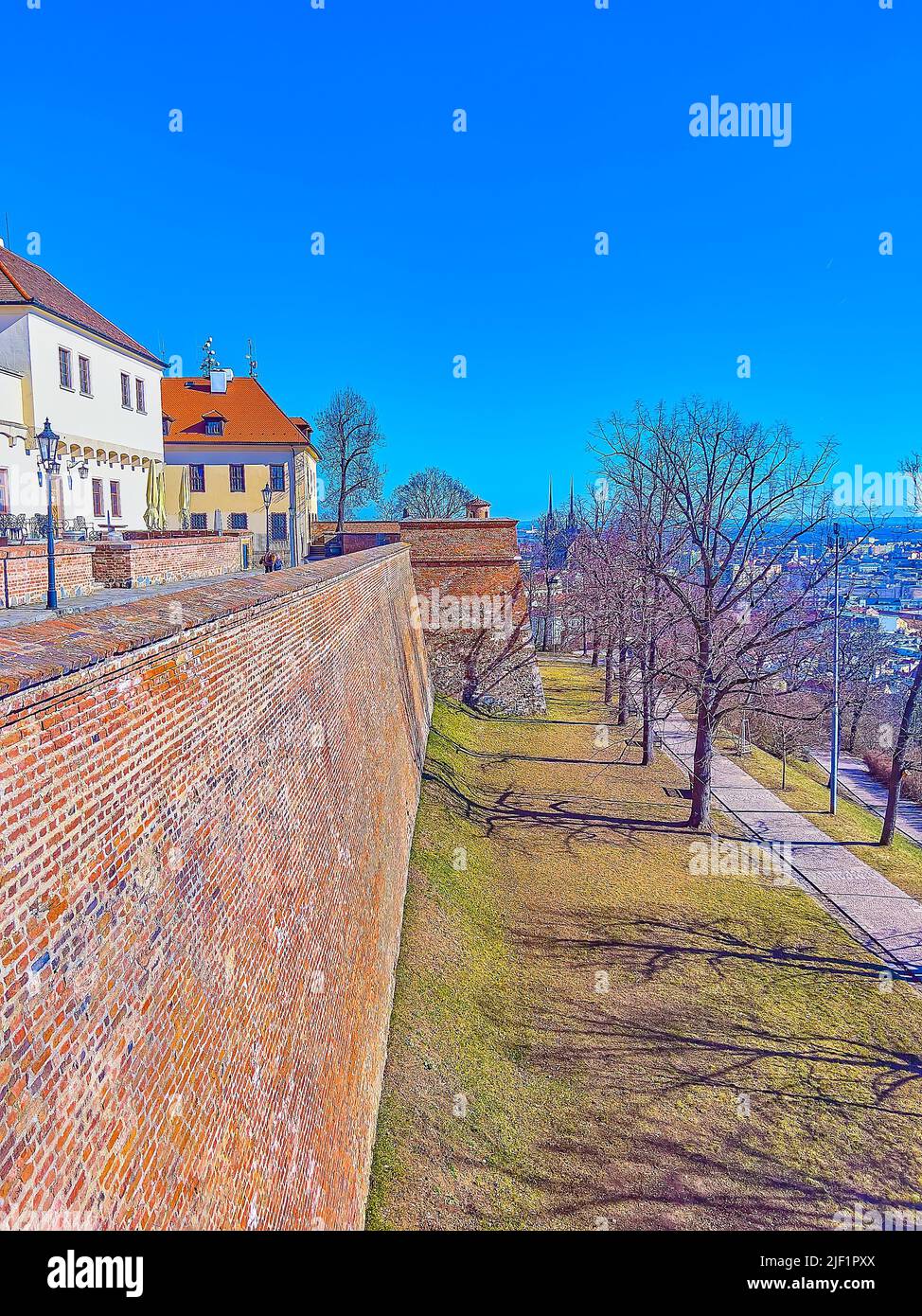 The outer walls and bastions of medieval Spilberk Castle and the small ...
