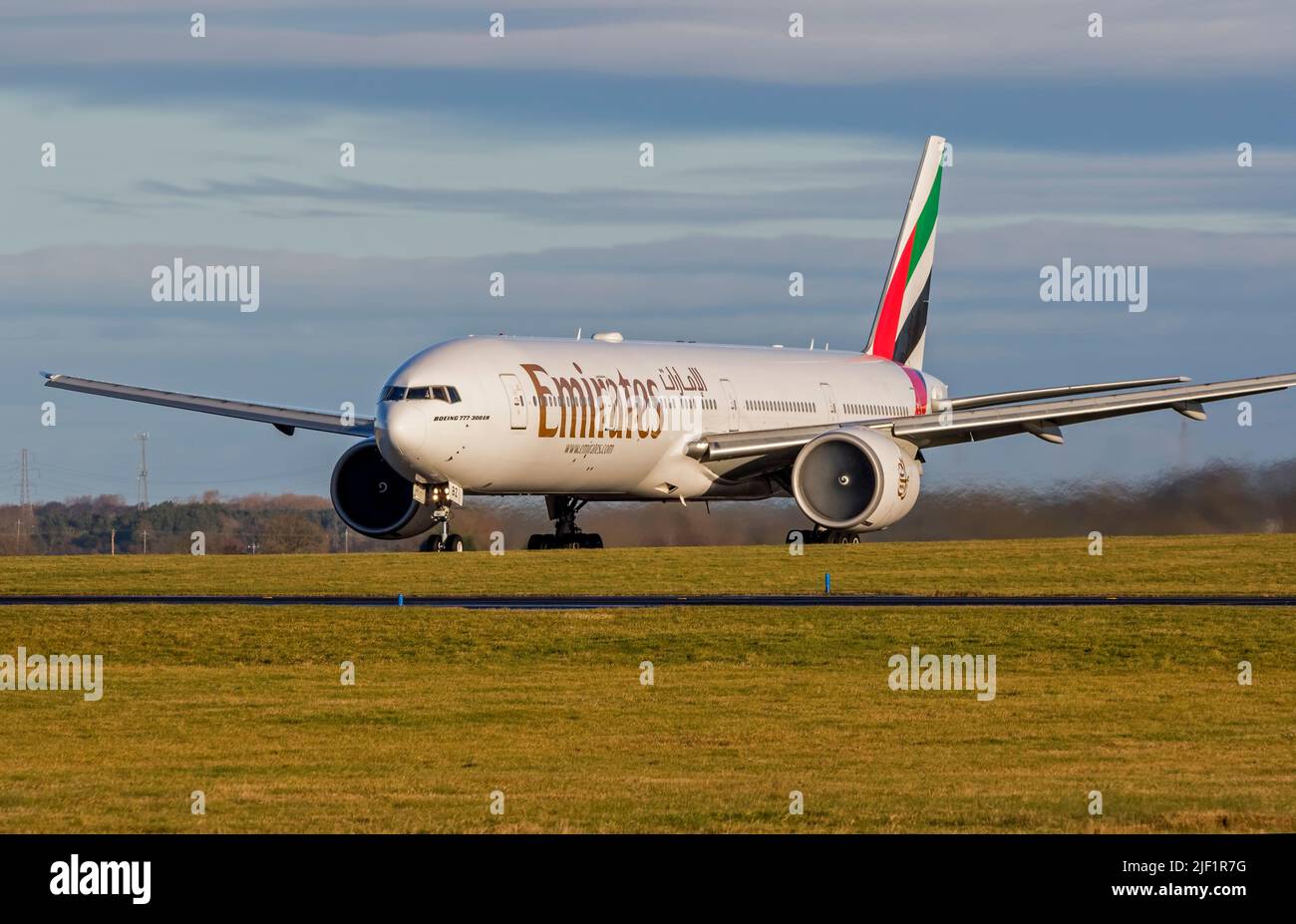 Emirates 777 at Newcastle airport Stock Photo - Alamy
