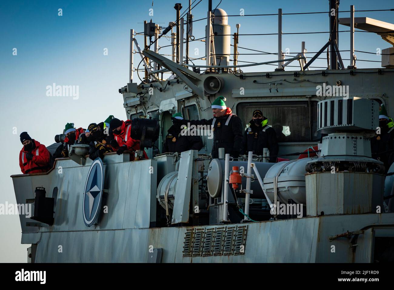 Sailors line the bridge wing of HMCS Fredericton returns to Halifax ...